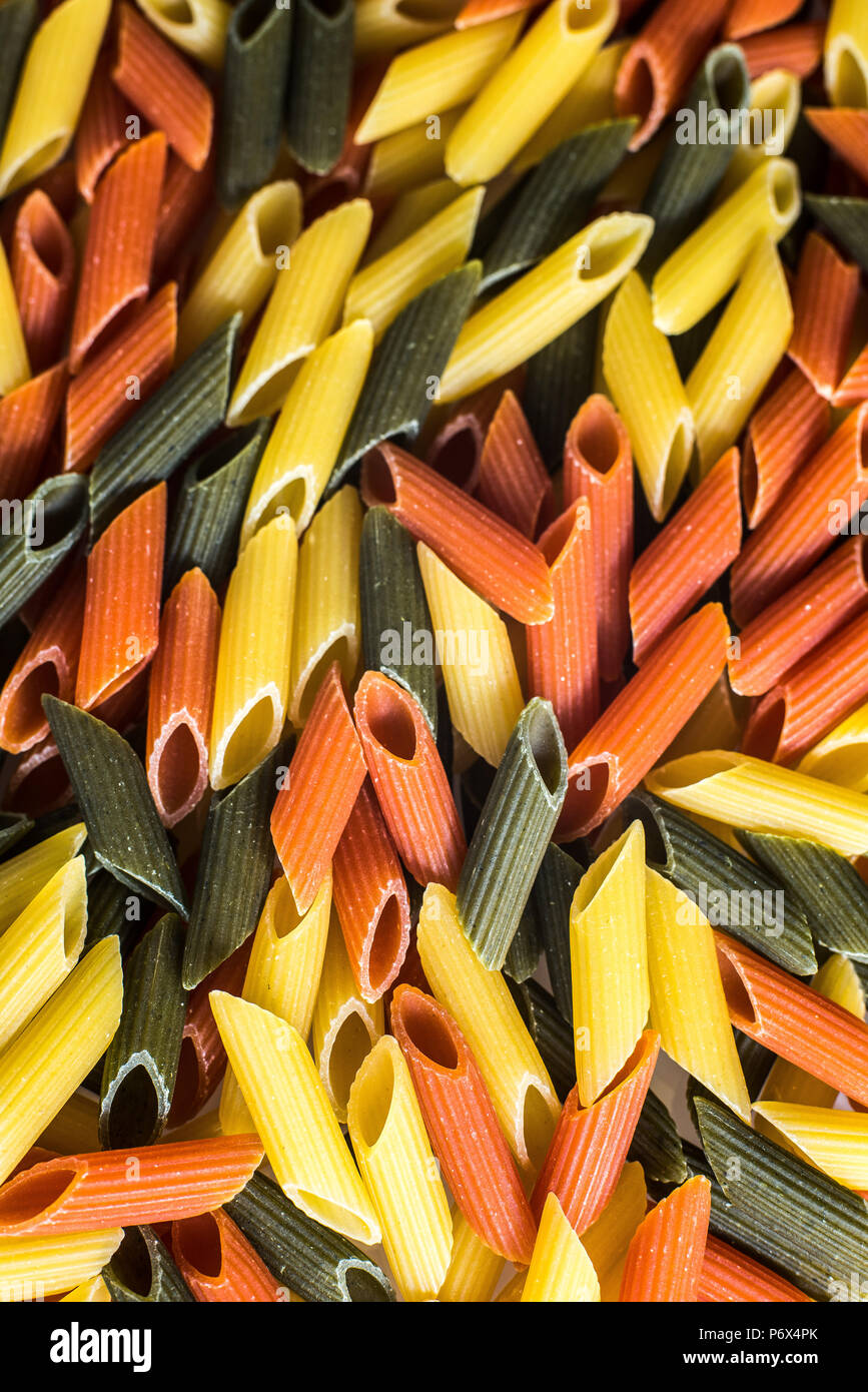 Macaroni tricolor with organic pasta integral Stock Photo - Alamy