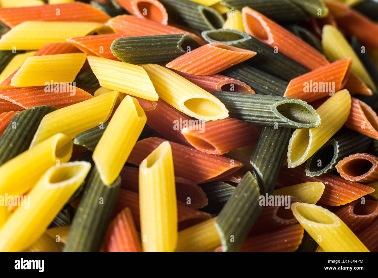 Macaroni tricolor with organic pasta integral Stock Photo - Alamy