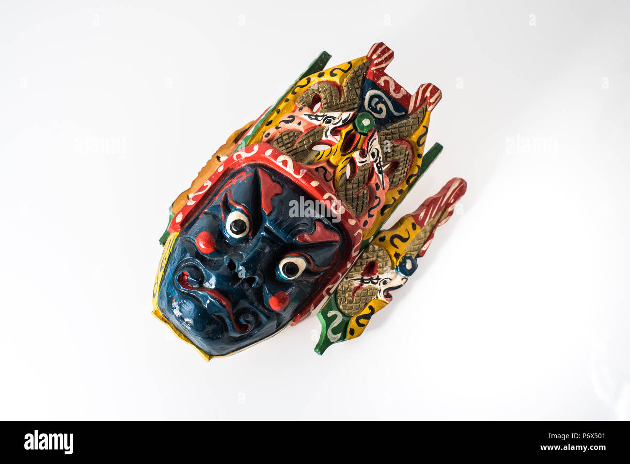 Ancient traditional mask made of wood with asian devil face Stock Photo ...