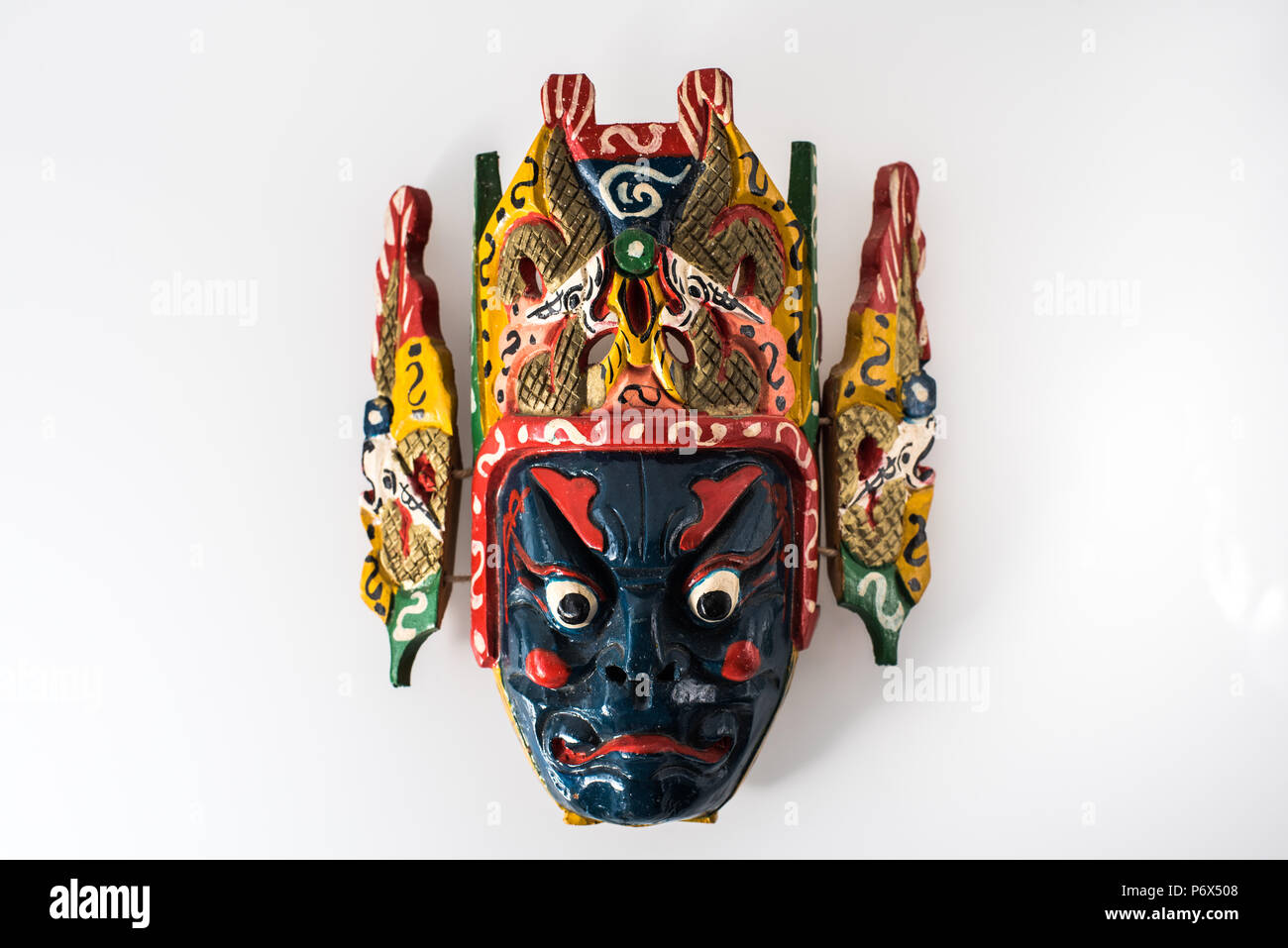 Ancient traditional mask made of wood with asian devil face Stock Photo ...