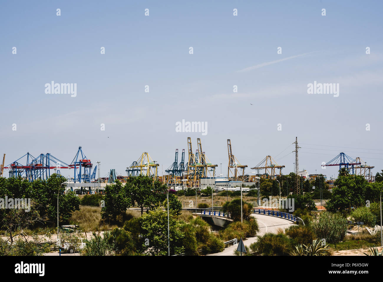 Cranes of longshoremen in the seaport of Valencia in the Mediterranean ...