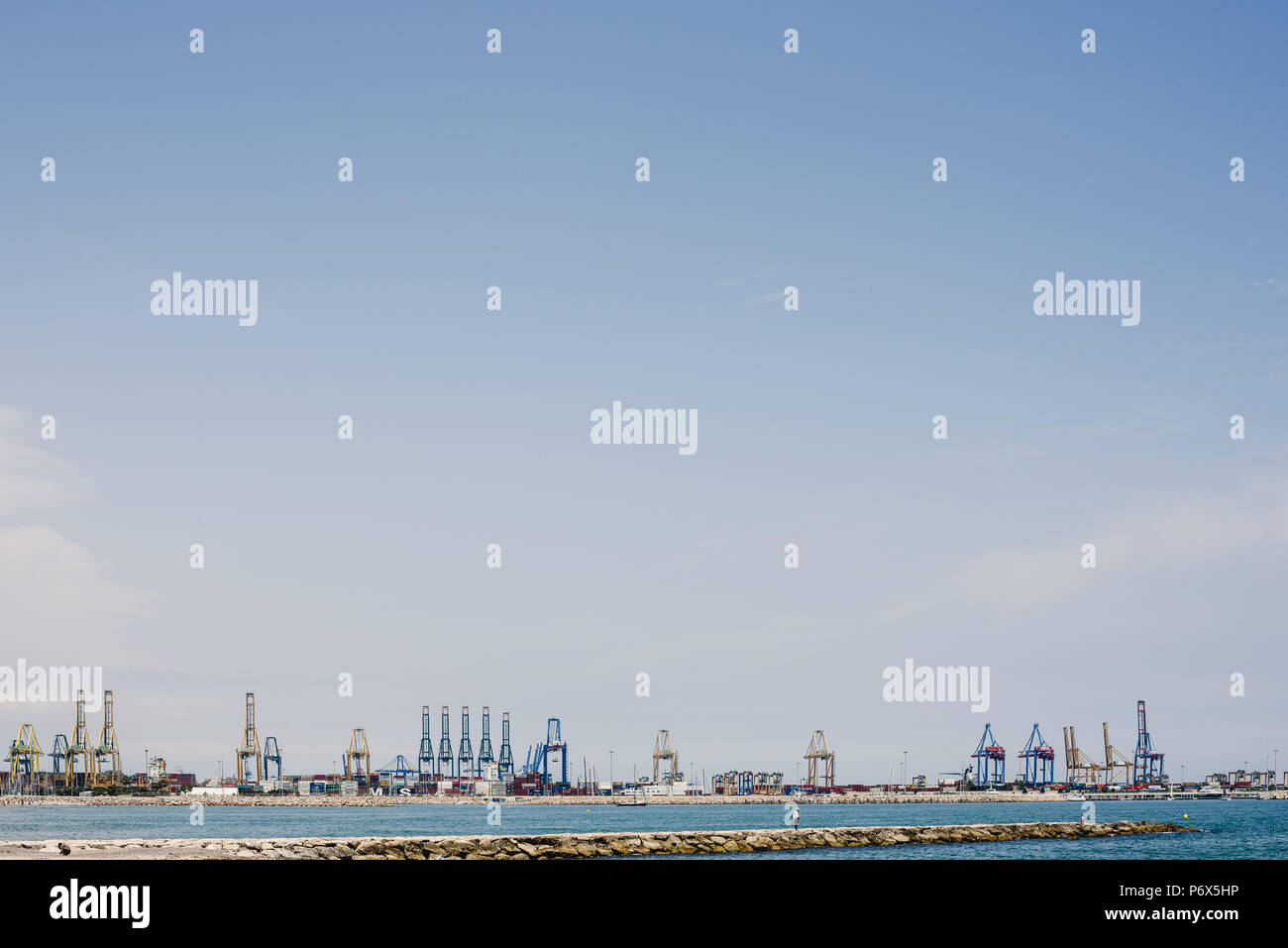 Cranes of longshoremen in the seaport of Valencia in the Mediterranean ...