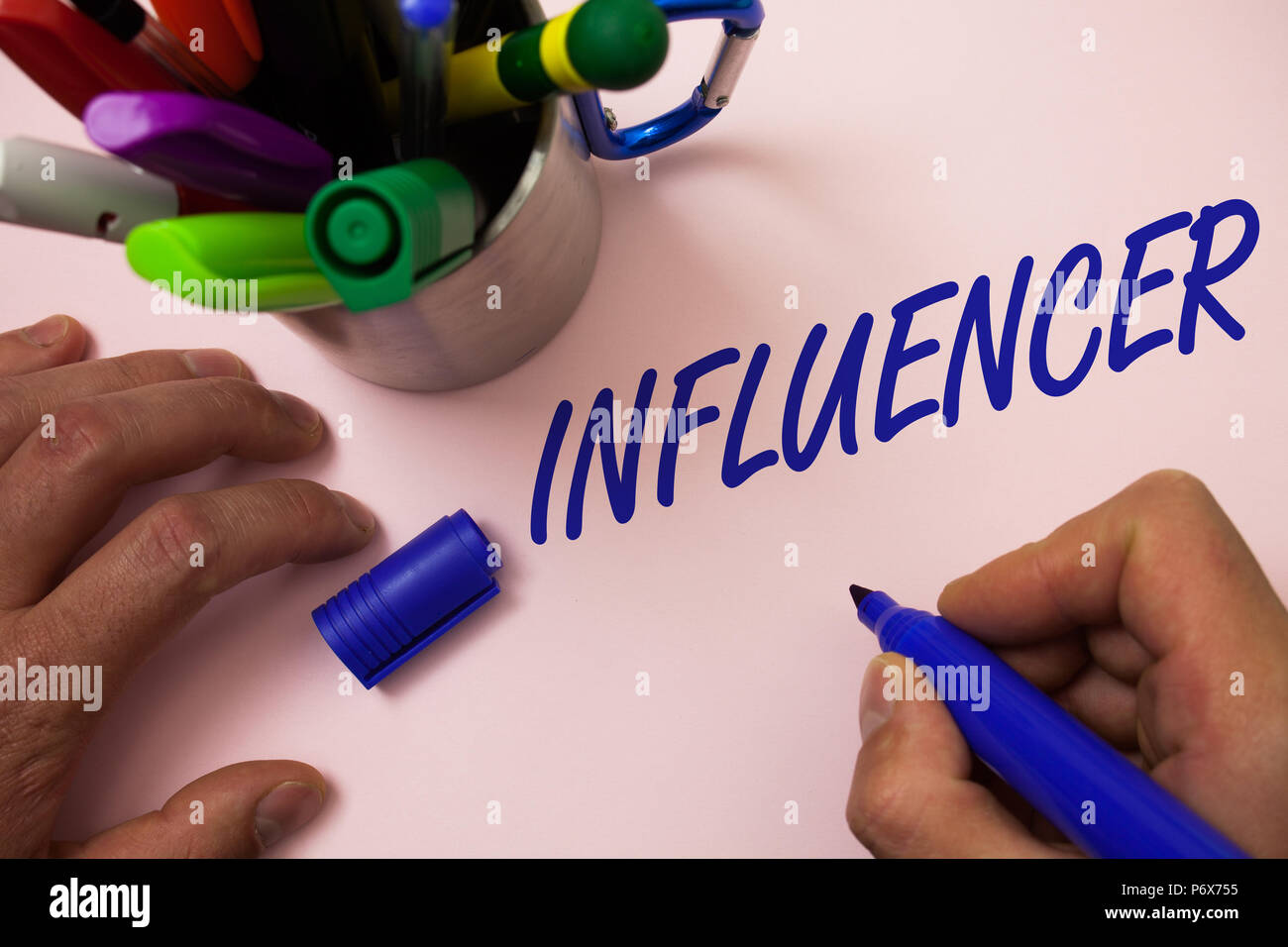 Handwriting text writing Influencer. Concept meaning Person who ...