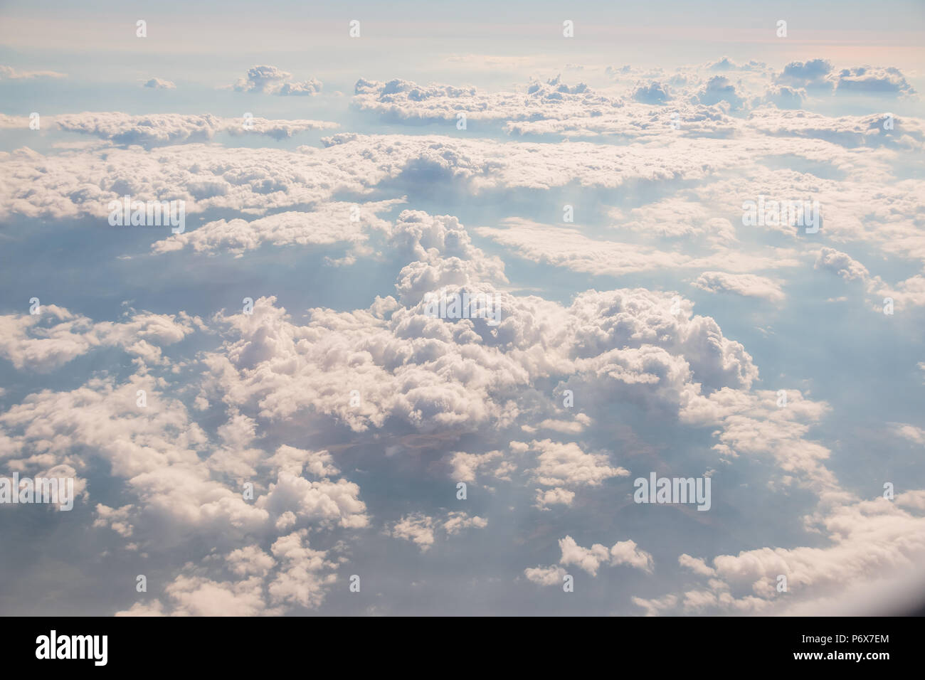 Skyline View above the Clouds from air plane. Go to vacation concept ...