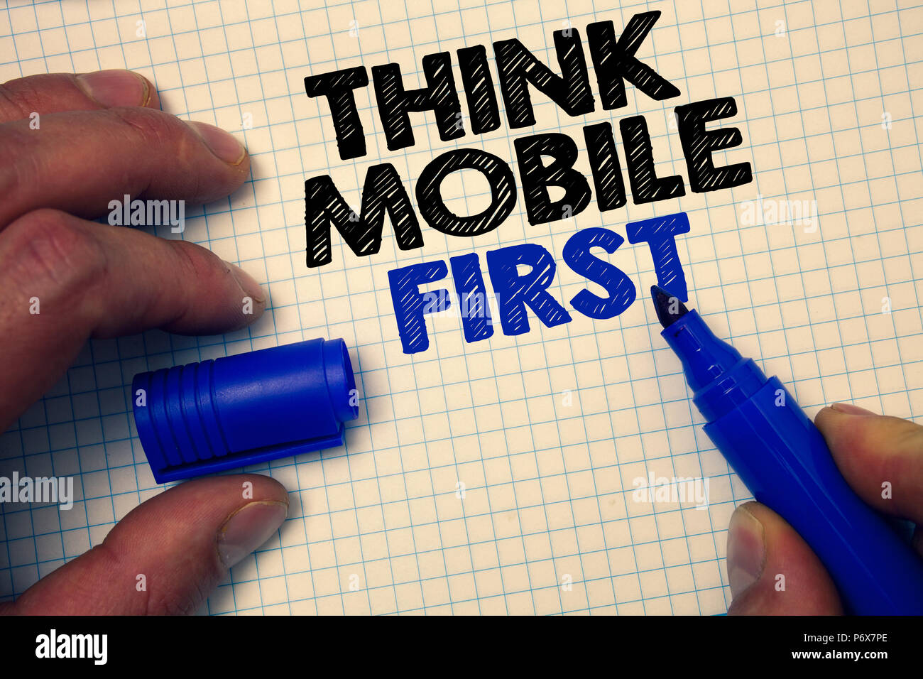 Text sign showing Think Mobile First. Conceptual photo Handheld devises ...