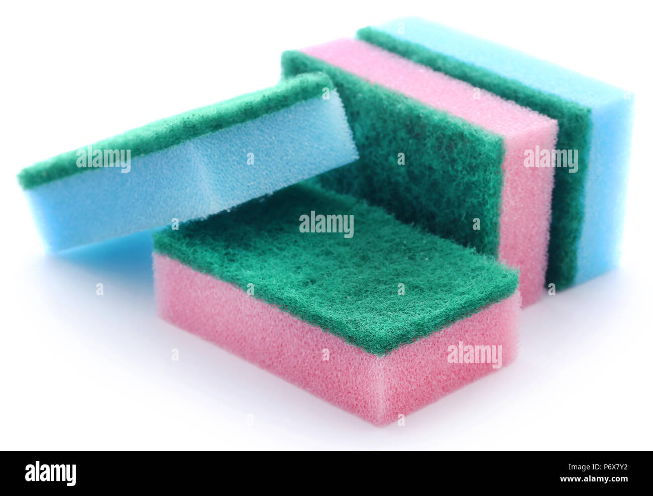Kitchen sponge with scotch brite over white background Stock Photo - Alamy