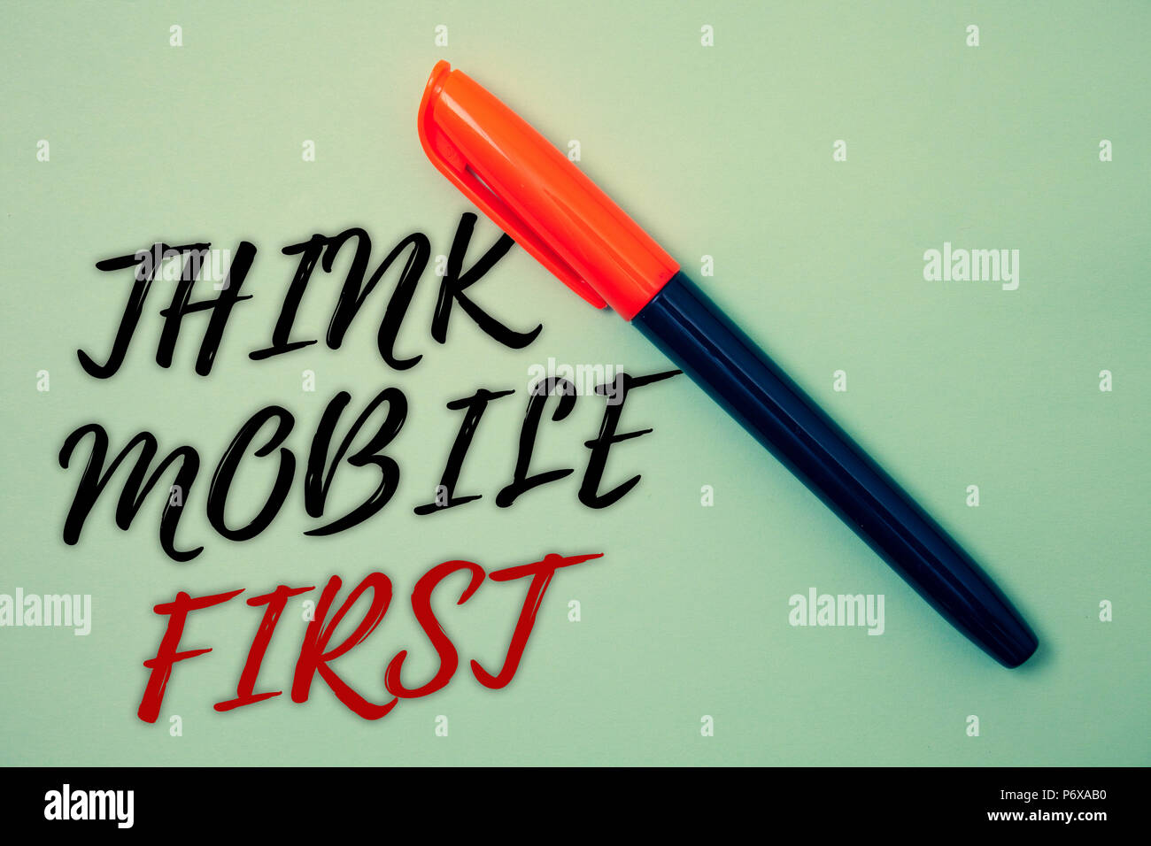 Text sign showing Think Mobile First. Conceptual photo Handheld devises marketing target ...