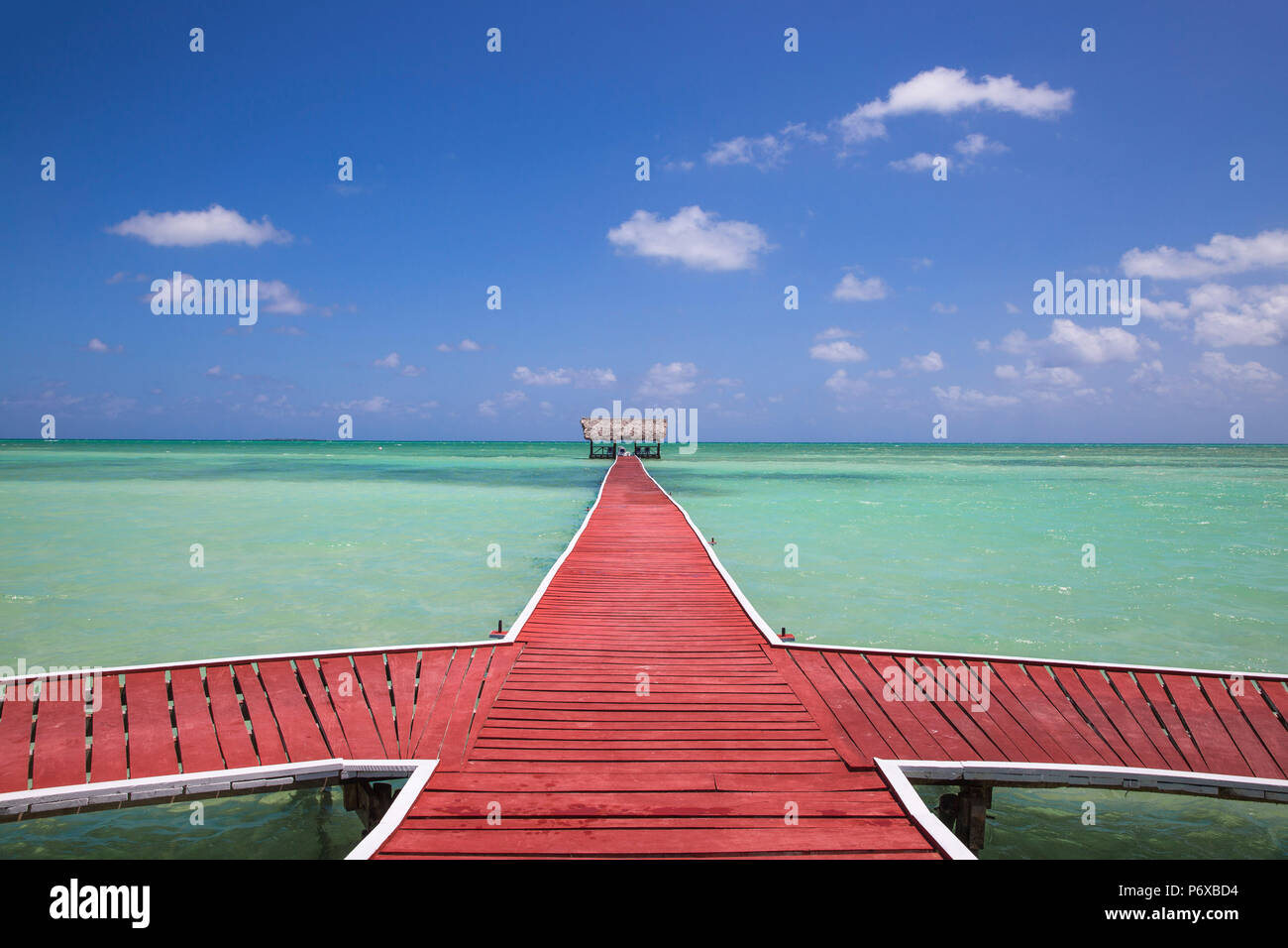 Cuba, Jardines del Rey, Cayo Guillermo, Playa El Paso, Wooden red jetty ...