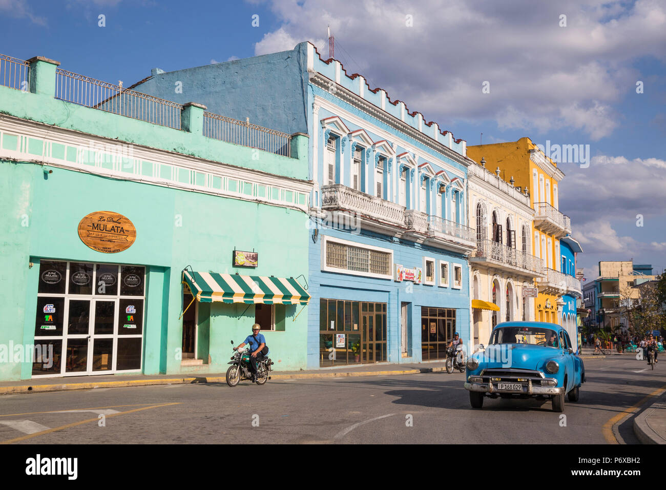 Cuba, Sancti Spiritus, Sancti Spiritus, Buildings lining Parque Serafin ...