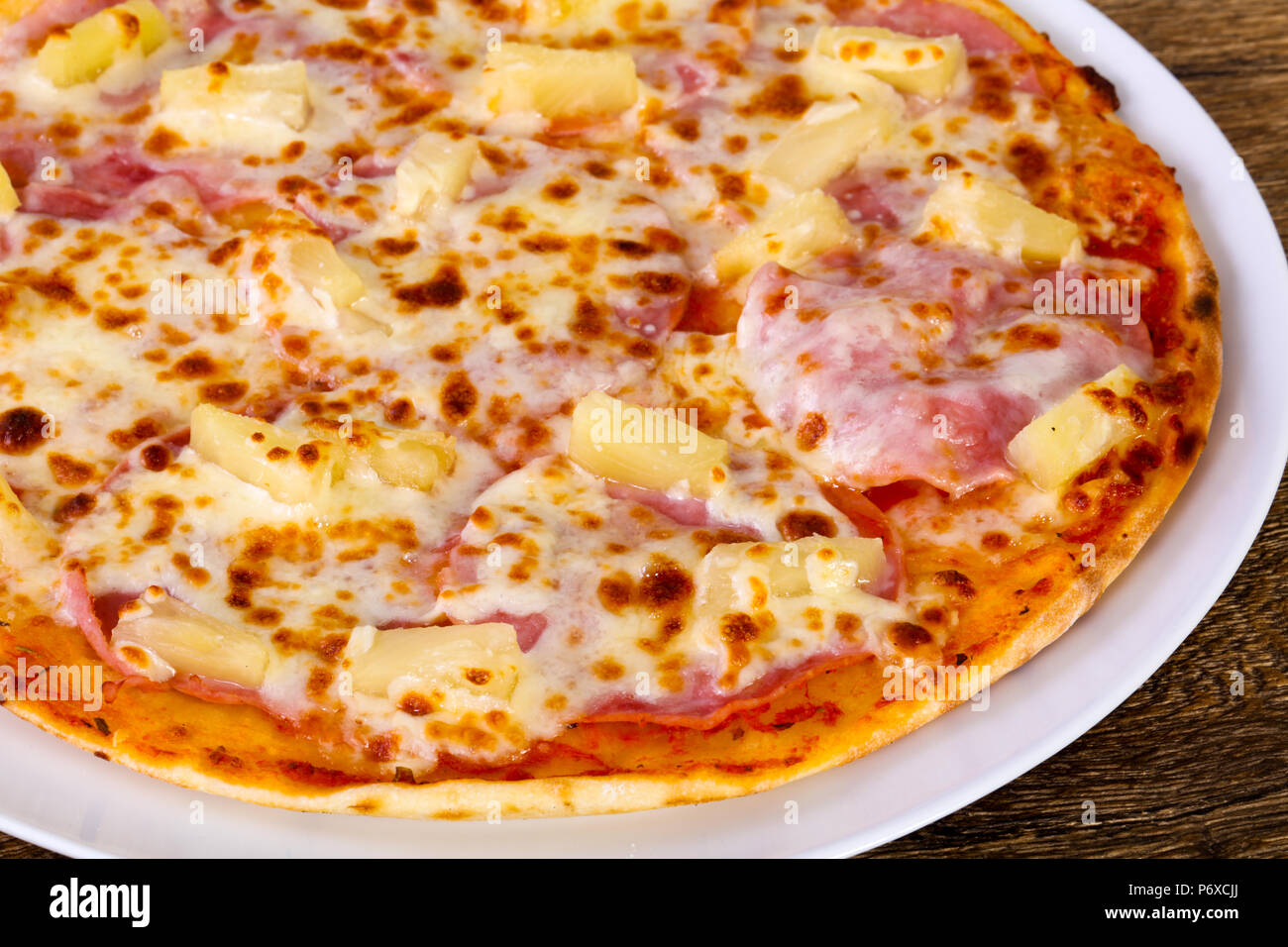 Pizza with ham and cheese Stock Photo - Alamy