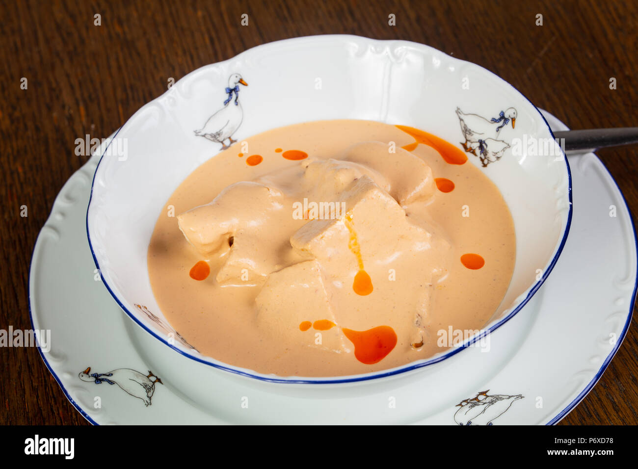 Georgian traditional cuisine - satsivi with chicken Stock Photo - Alamy