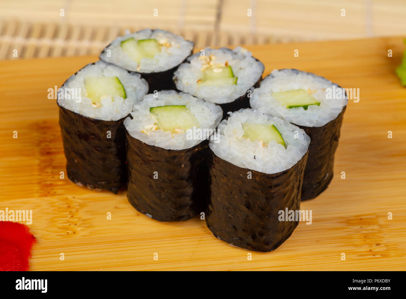 Delicious cucumber mini sushi rolls Stock Photo - Alamy