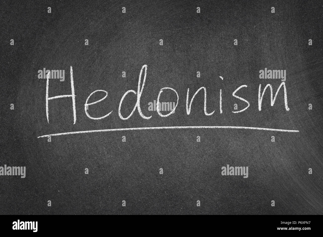 Hedonism concept word on a blackboard background Stock Photo - Alamy