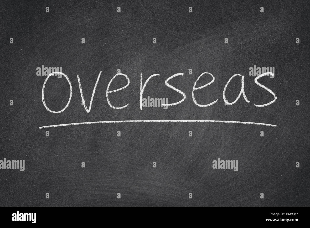 overseas concept word on a blackboard background Stock Photo - Alamy