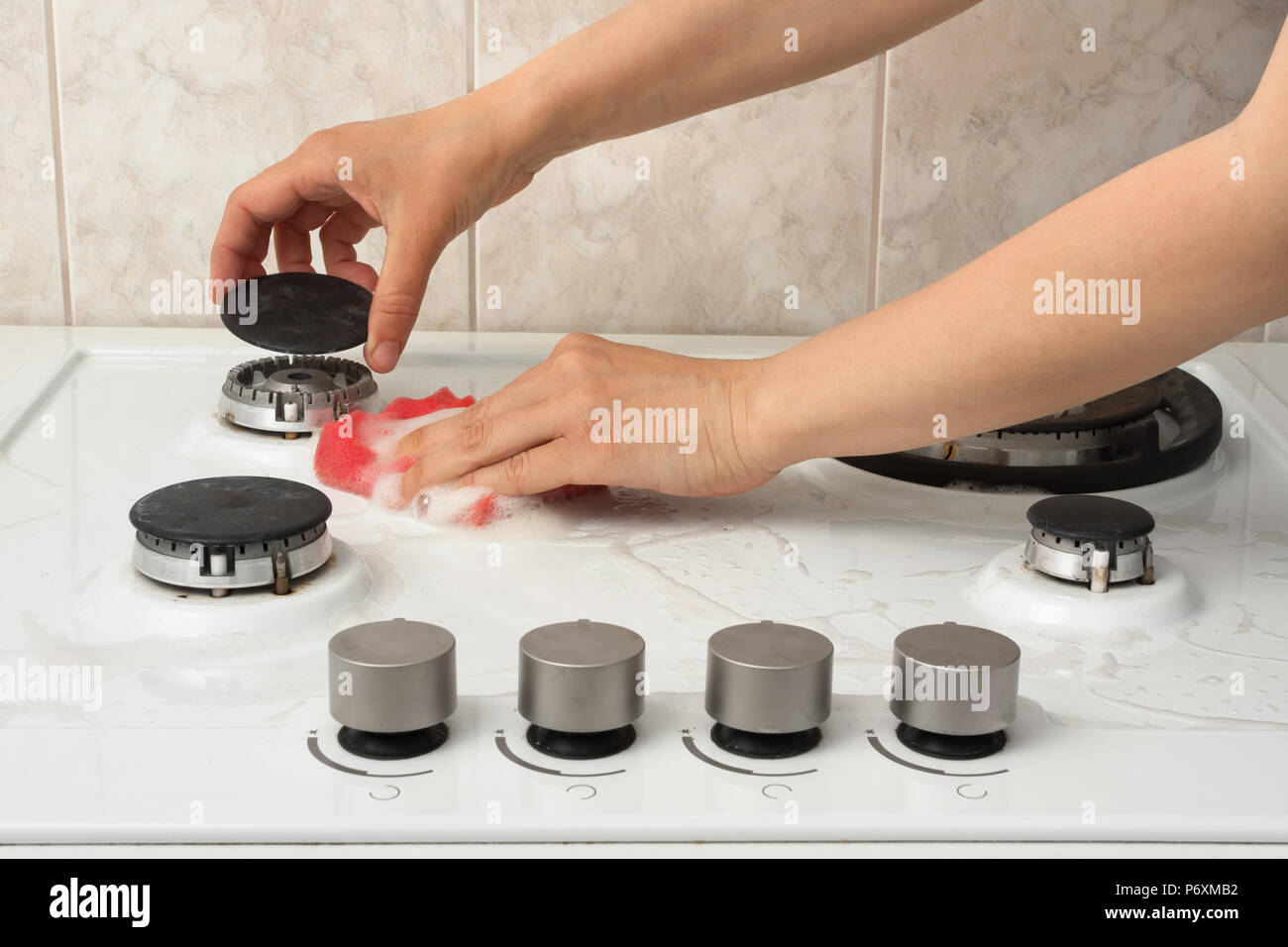 Kitchen stove cleaning hi-res stock photography and images - Alamy