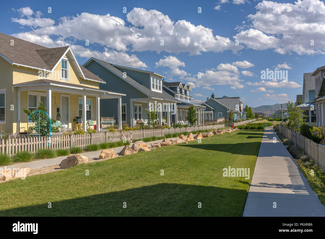 Community lawn between homes and sidewalks Stock Photo - Alamy