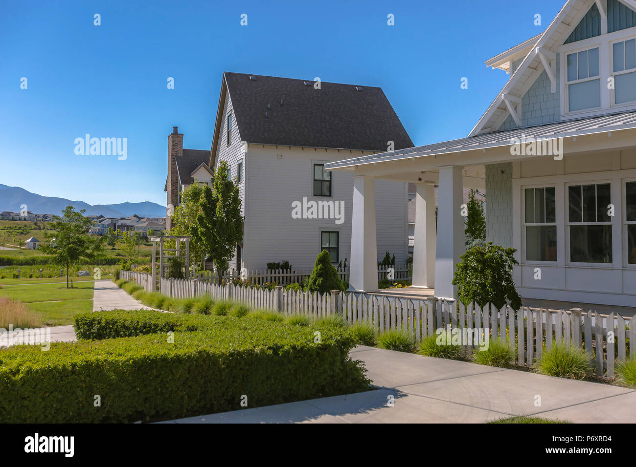 Community walkway between homes Stock Photo - Alamy