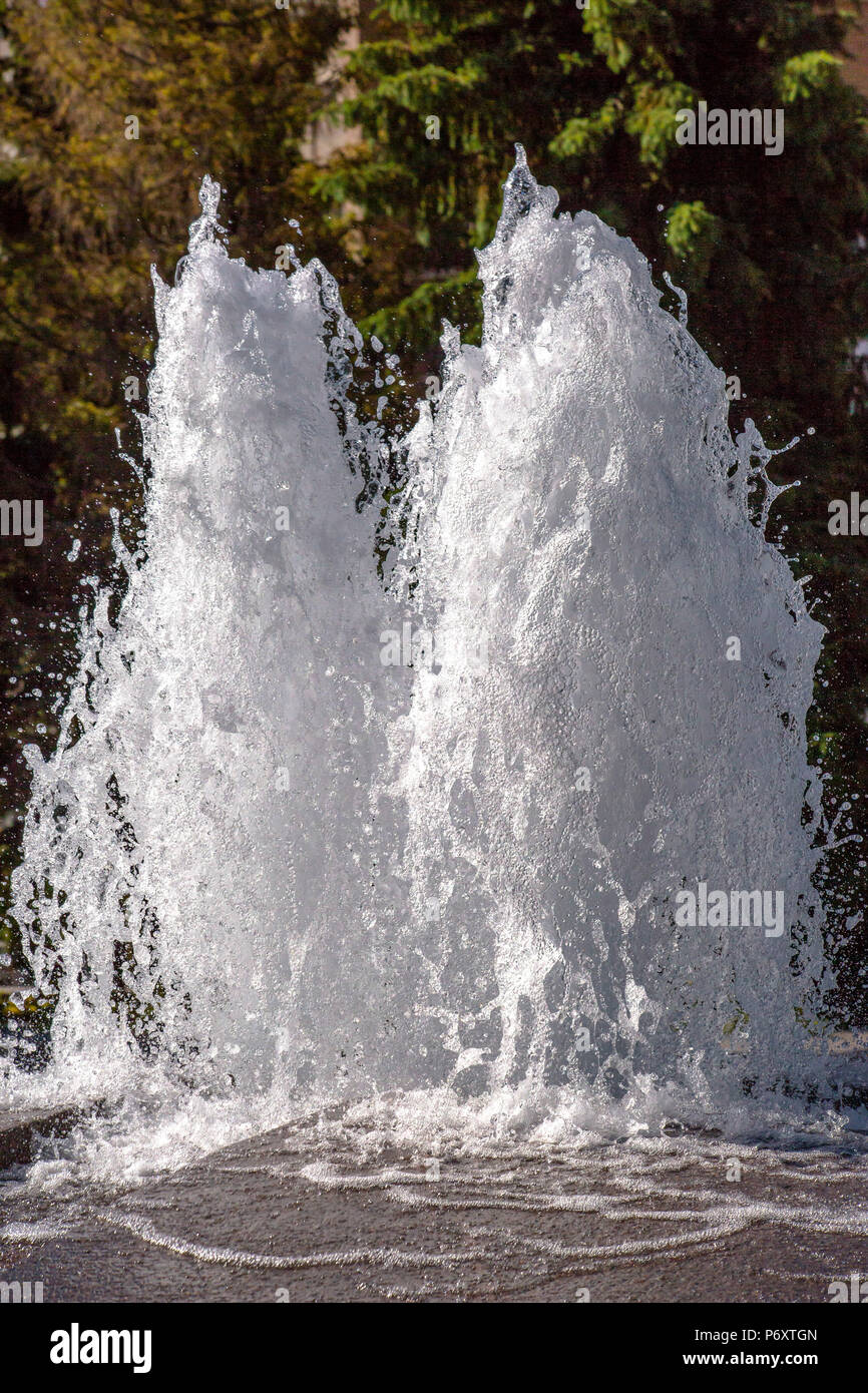 Double water jets at conference center Stock Photo - Alamy