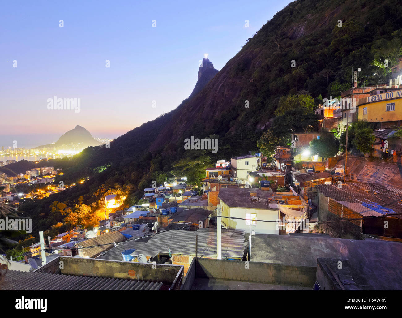 Brazil, City of Rio de Janeiro, Twilight view of the Favela Santa Marta ...