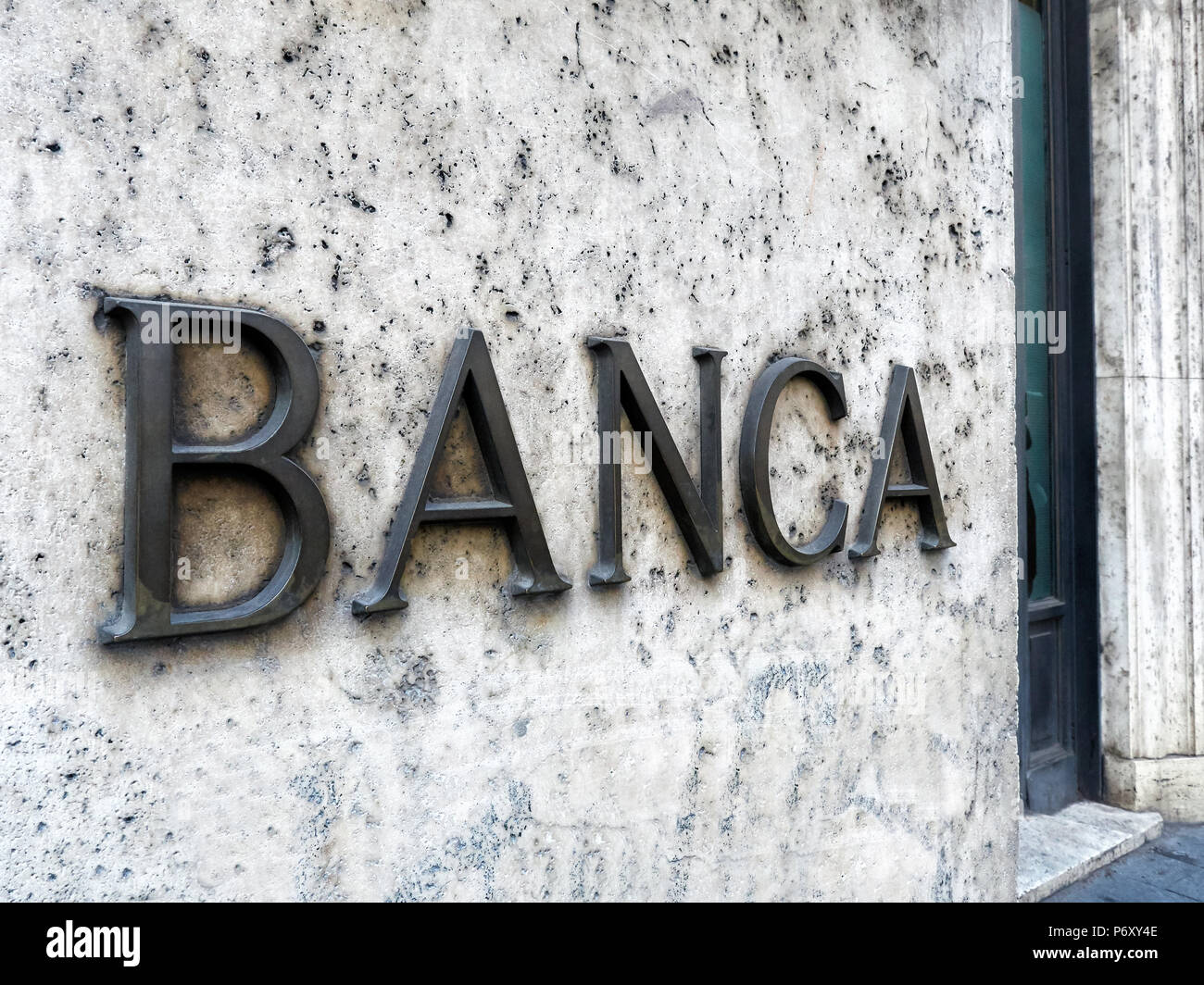 Bank (Banca in italian) entrance with sign on marble wall Stock Photo ...