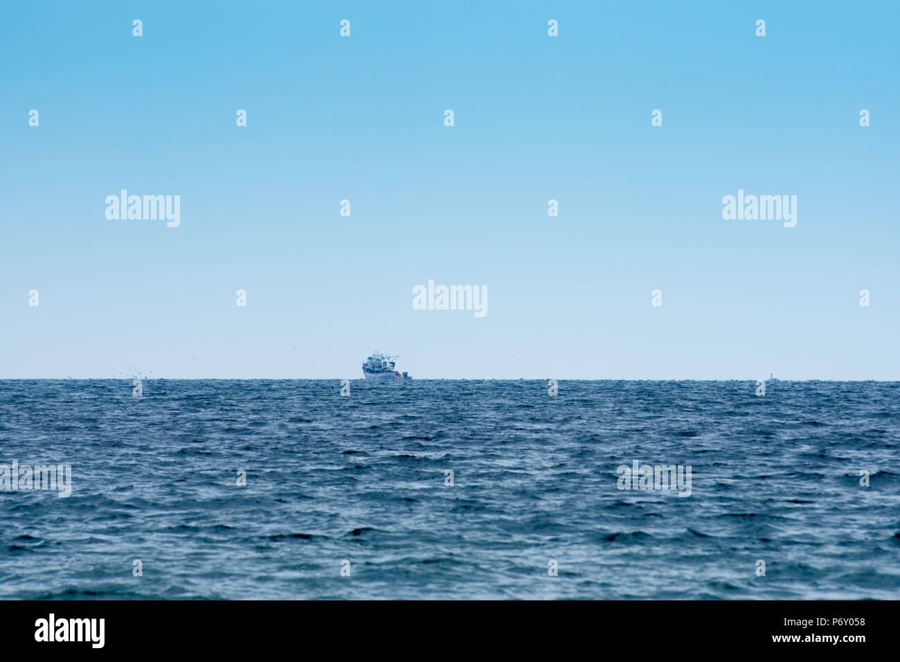 Distant boat hi-res stock photography and images - Alamy