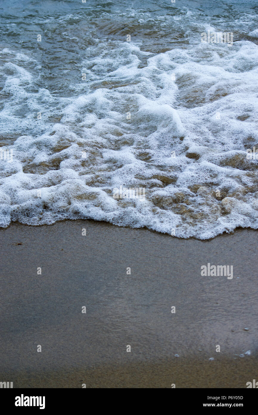 Half waves half sand hi-res stock photography and images - Alamy
