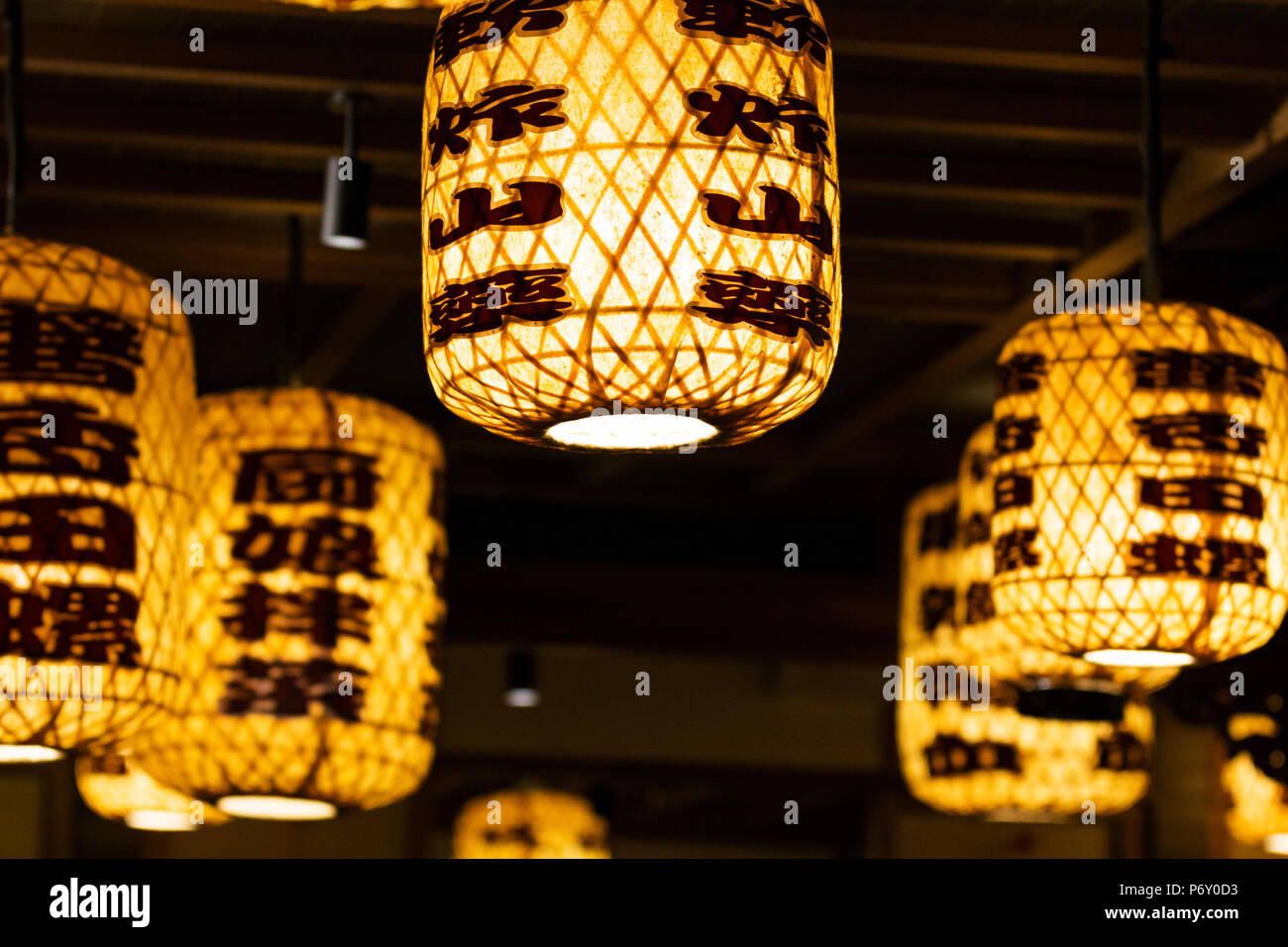 Yellow chinese lanterns hanging from hi-res stock photography and ...