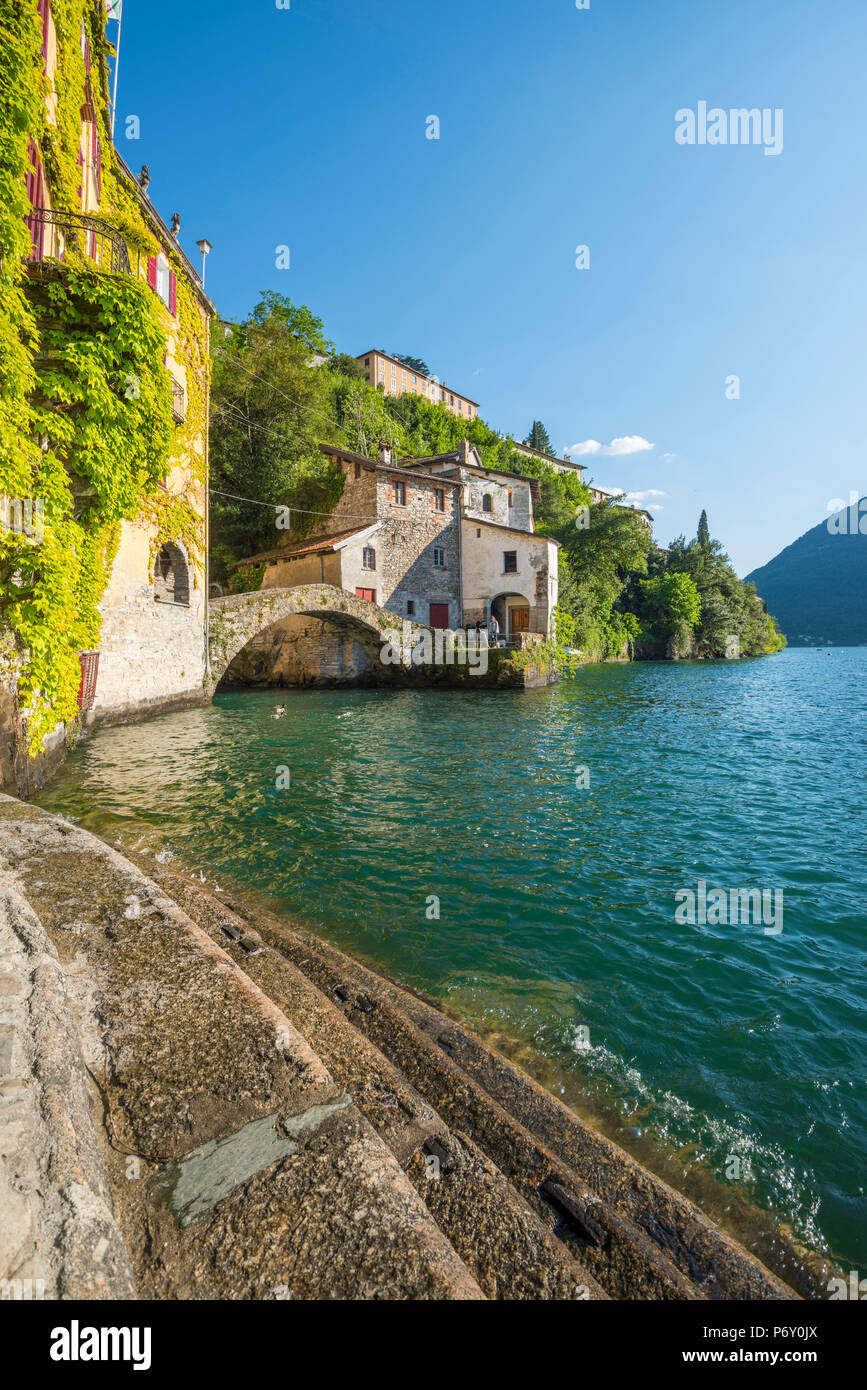 Nesso, lake Como, Como province, Italy. Lake shore and the roman stone ...