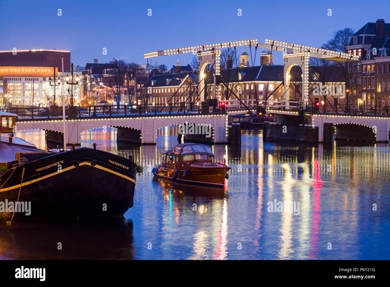 Netherlands, Amsterdam, Magere Brug, the Skinny Bridge, dusk Stock ...