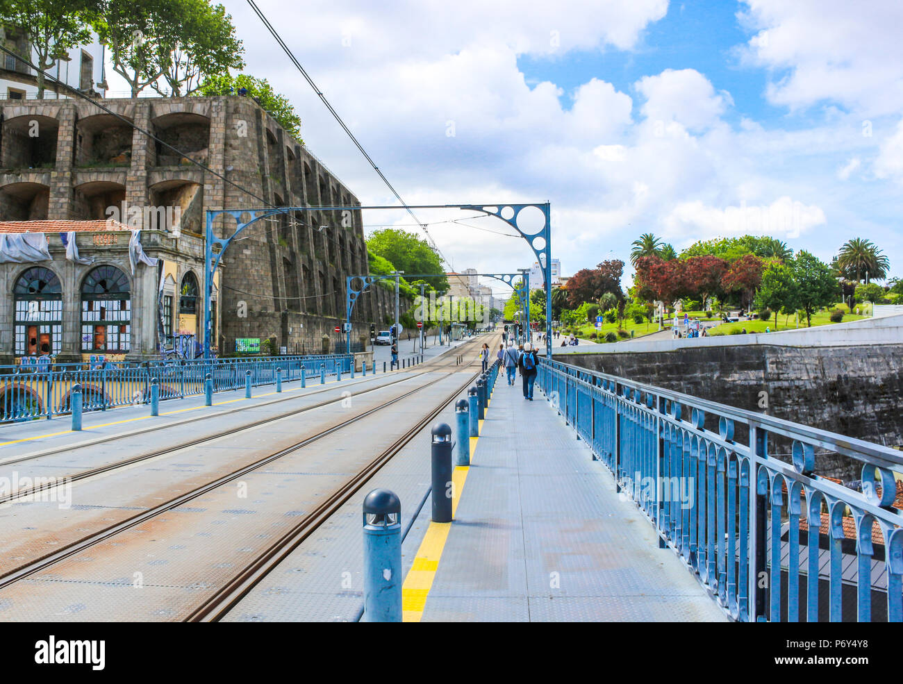 modern train tracks with sidewalk in city / railroad in city Stock ...