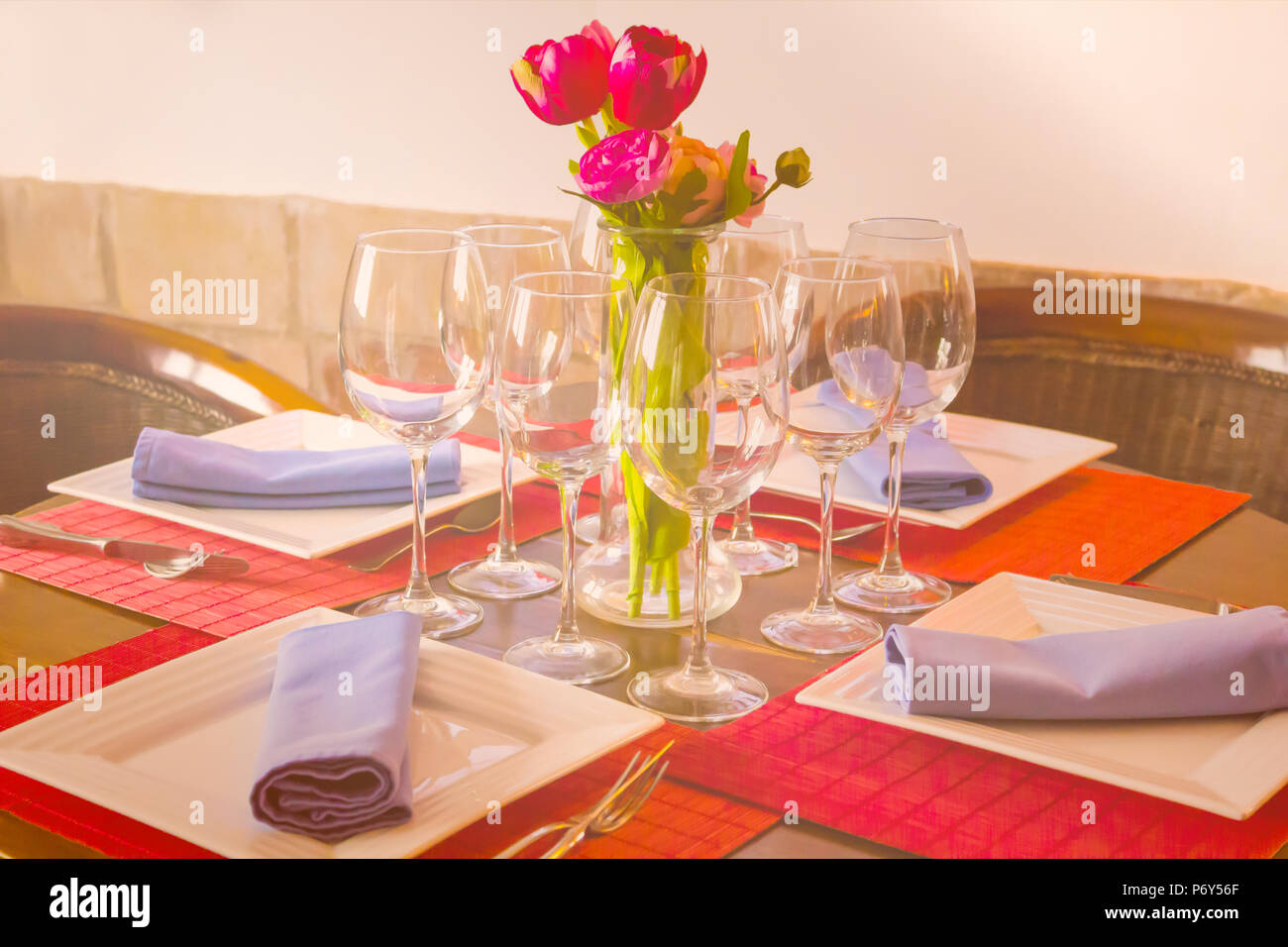 Empty glasses set in restaurant, detail of a dining table set up with ...