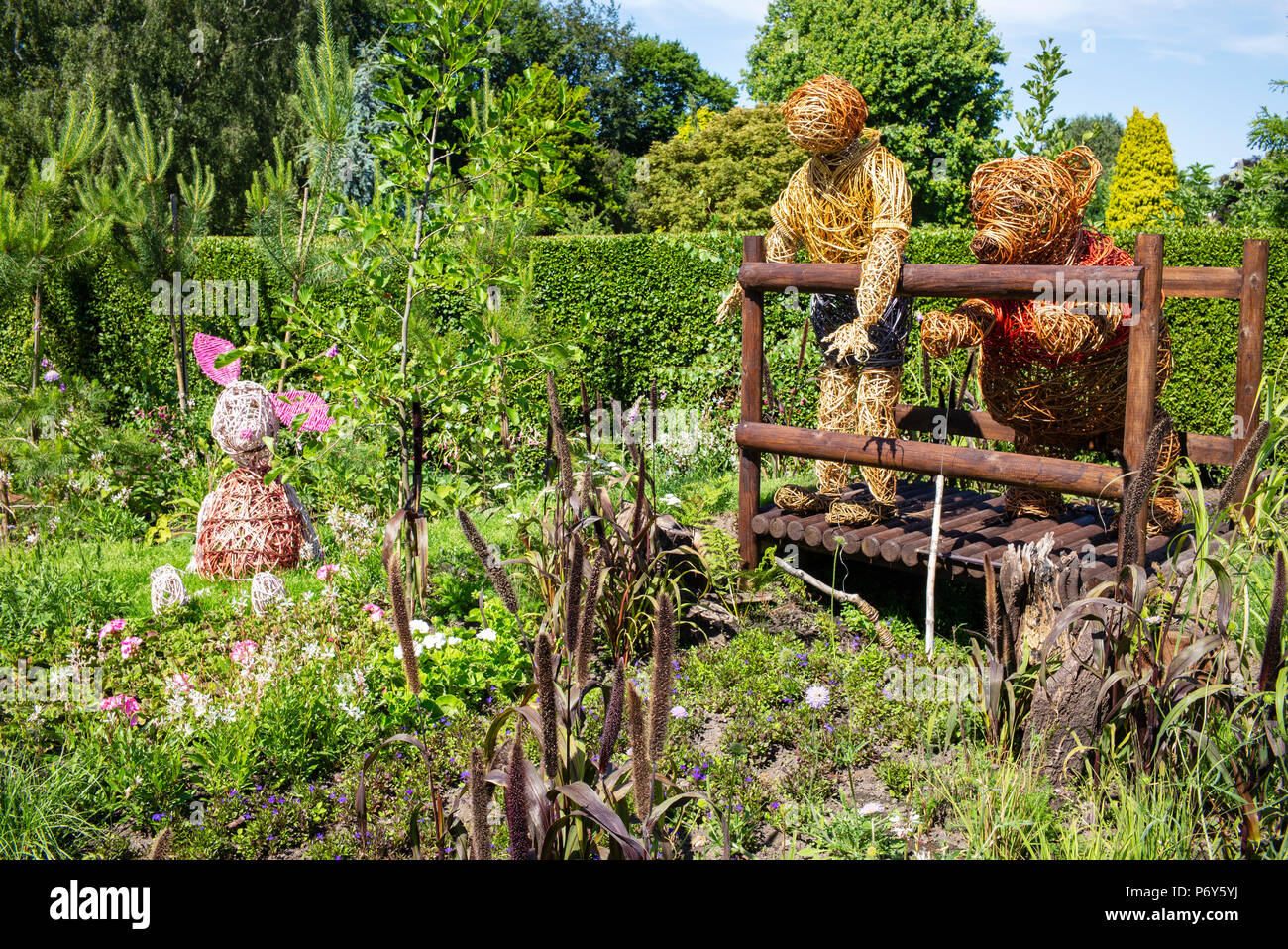 Piglet, quietly watching Christopher Robin and Winnie-the-Pooh playing ...