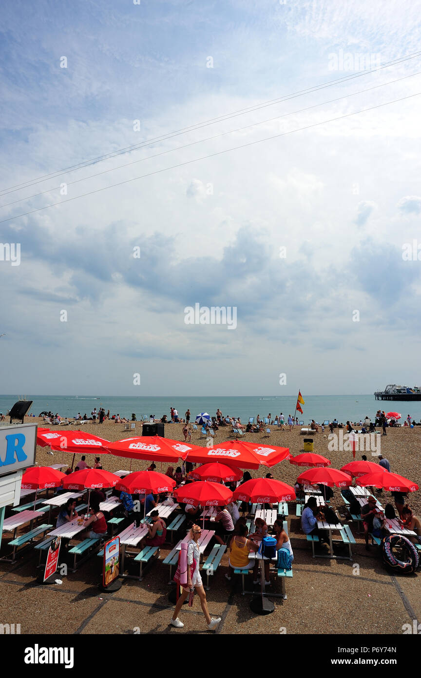 Red umbrellas on Brigton beach, English Seaside Town, Brighton & Hove ...