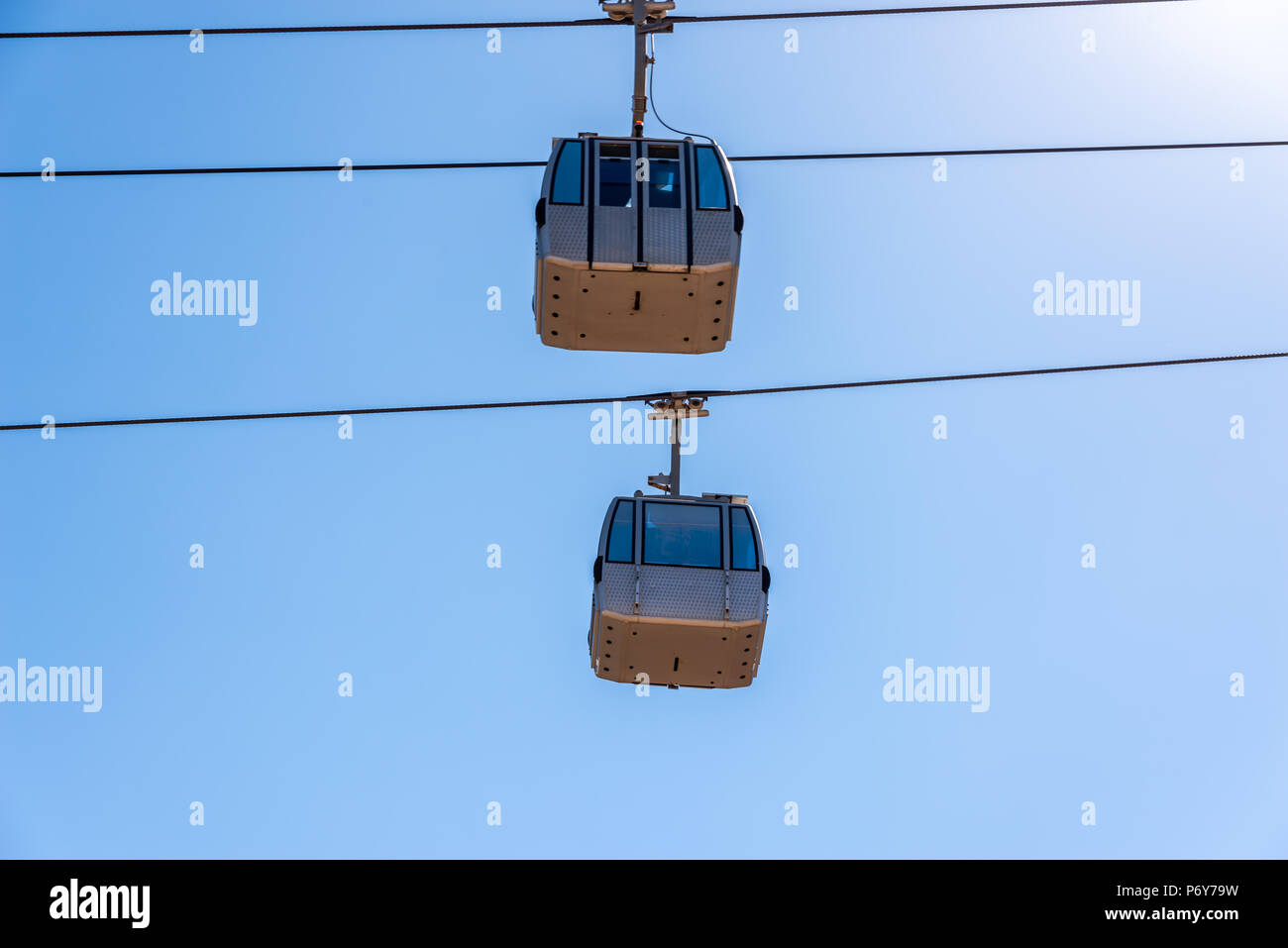 cableway against the sky, transport at height and tourist attraction ...