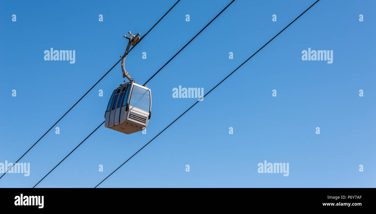 cableway against the sky, transport at height and tourist attraction ...