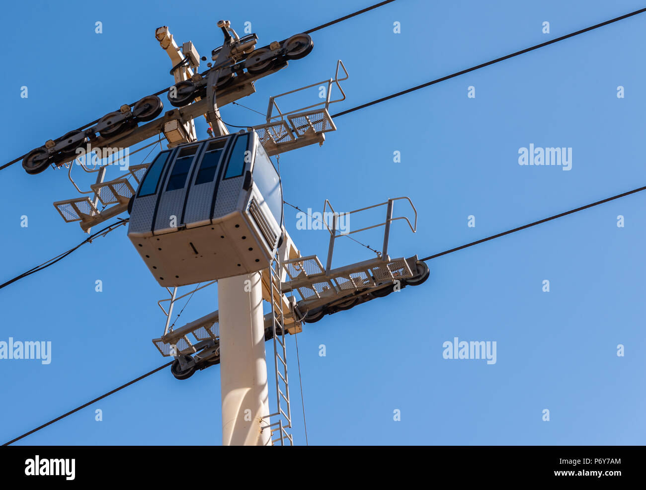 cableway against the sky, transport at height and tourist attraction ...