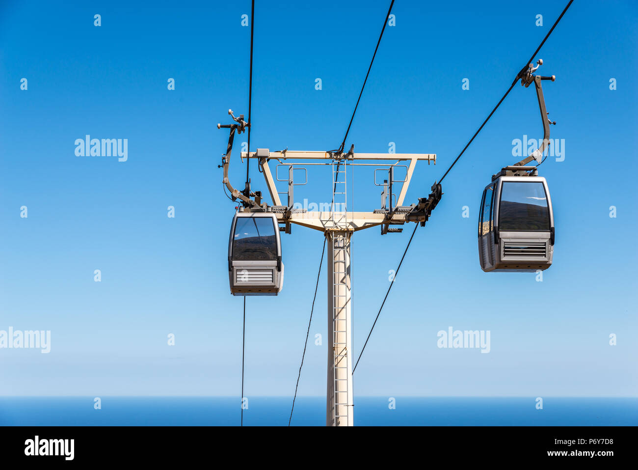 cableway against the sky, transport at height and tourist attraction ...