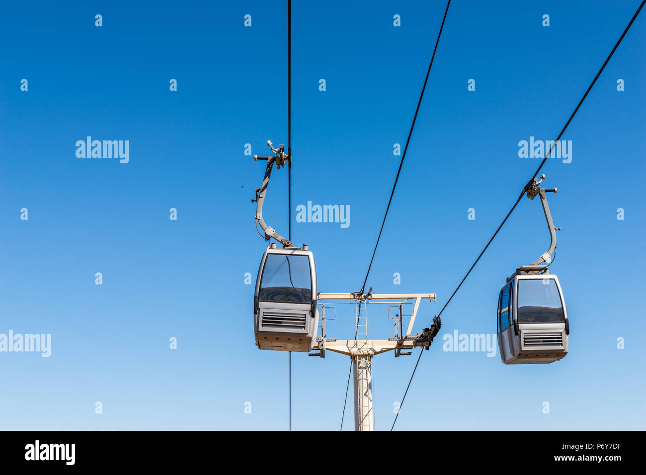 cableway against the sky, transport at height and tourist attraction ...