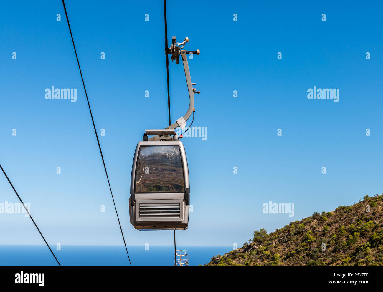 cableway against the sky, transport at height and tourist attraction ...