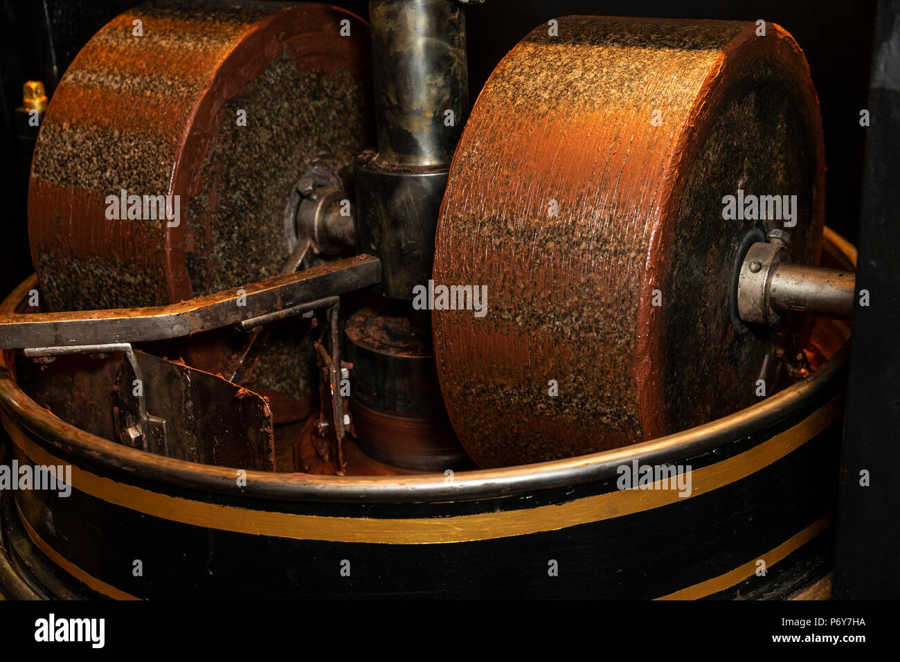 Antique chocolate mill machine Stock Photo - Alamy