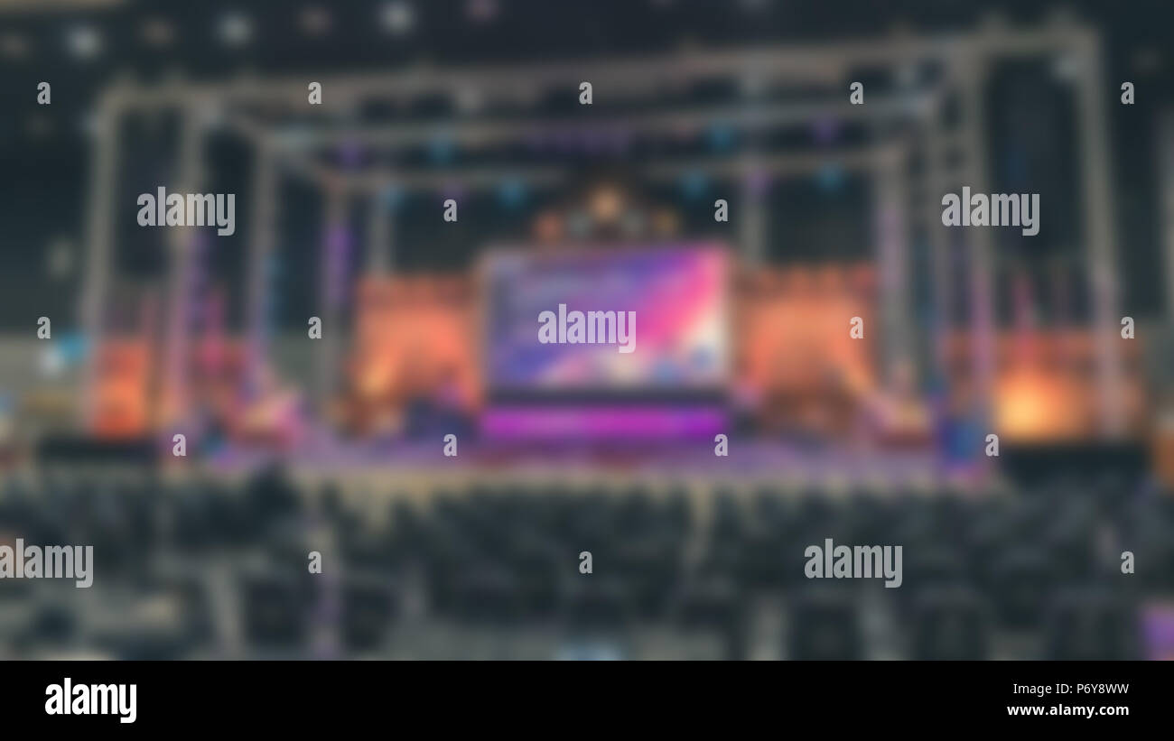 illuminated concert stage. defocused blur background Stock Photo - Alamy