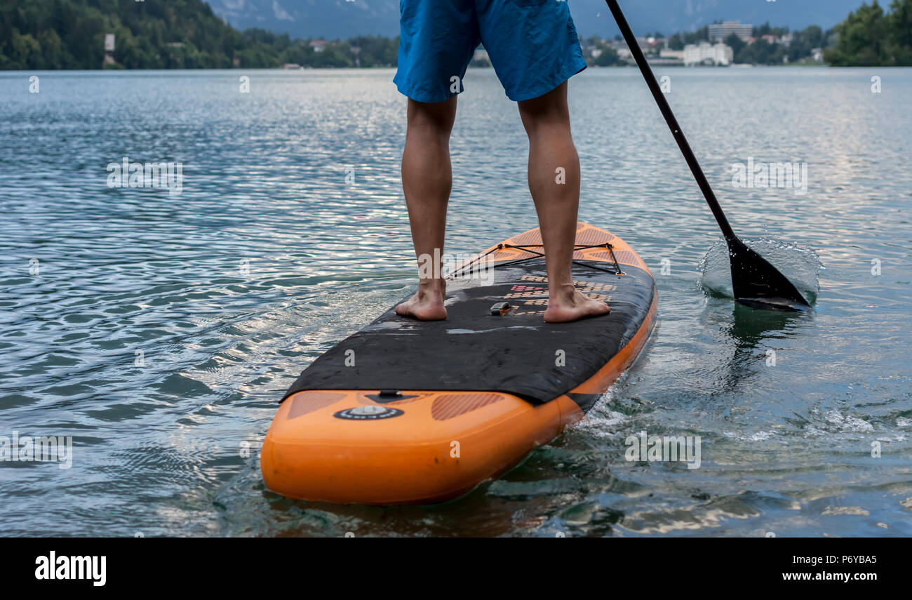 stand up paddle boarding on the lake Stock Photo - Alamy