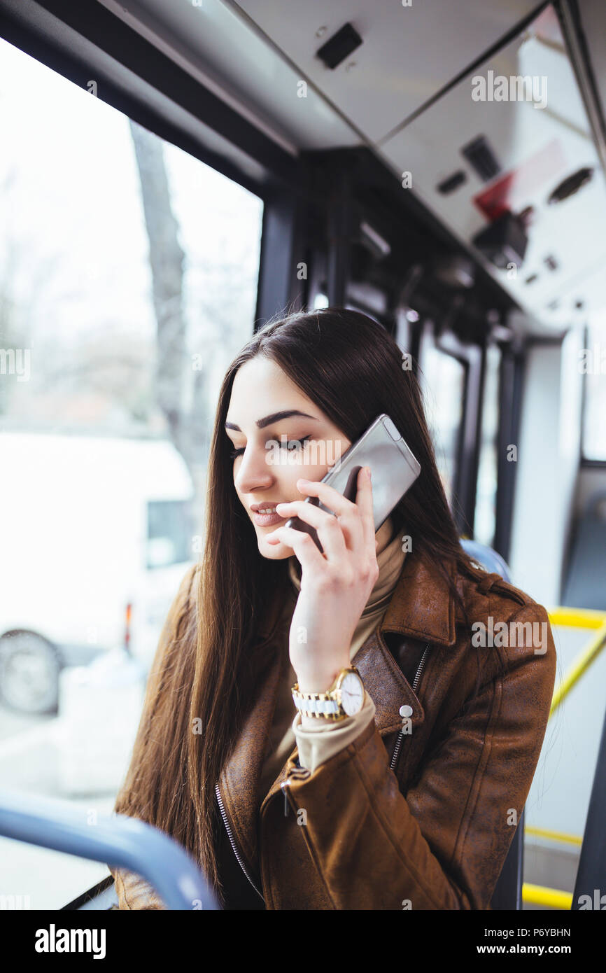 Pretty woman sitting on bus hi-res stock photography and images - Alamy
