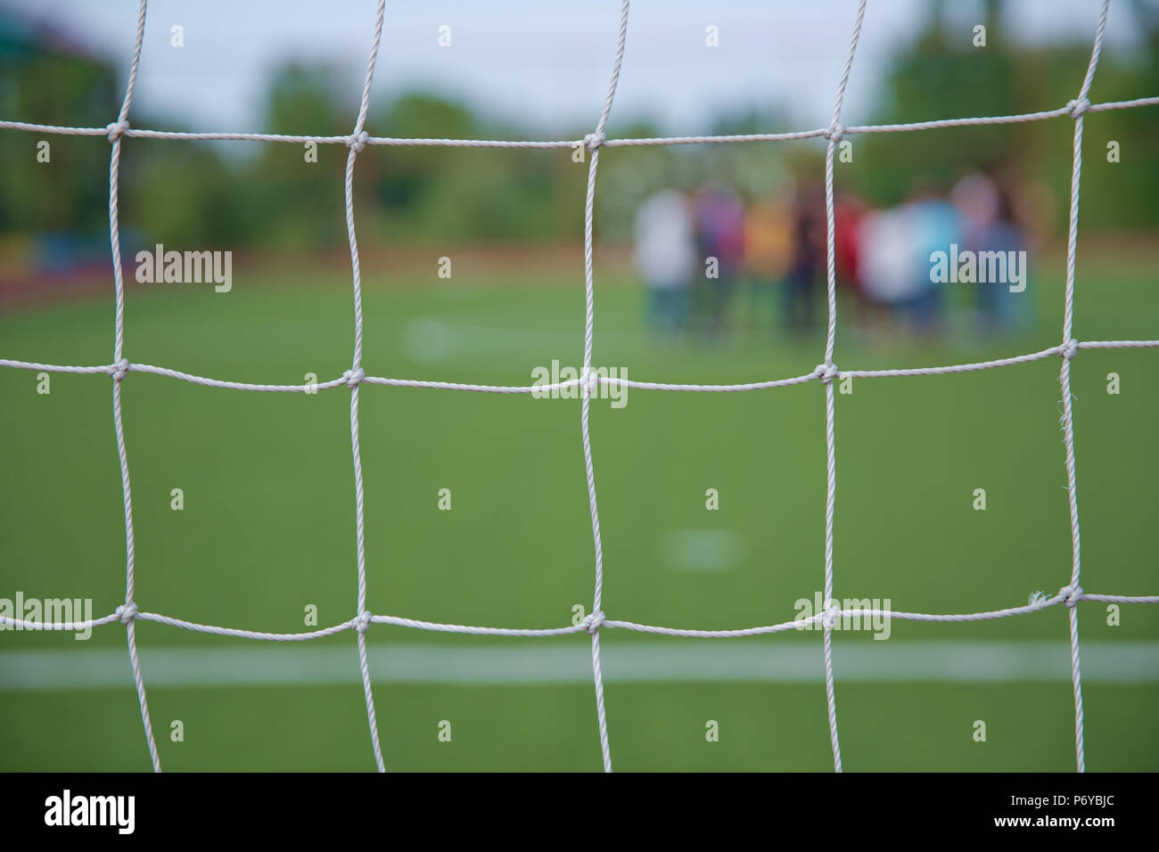 Mini Football Goal On An Artificial Grass . Football defocused players ...
