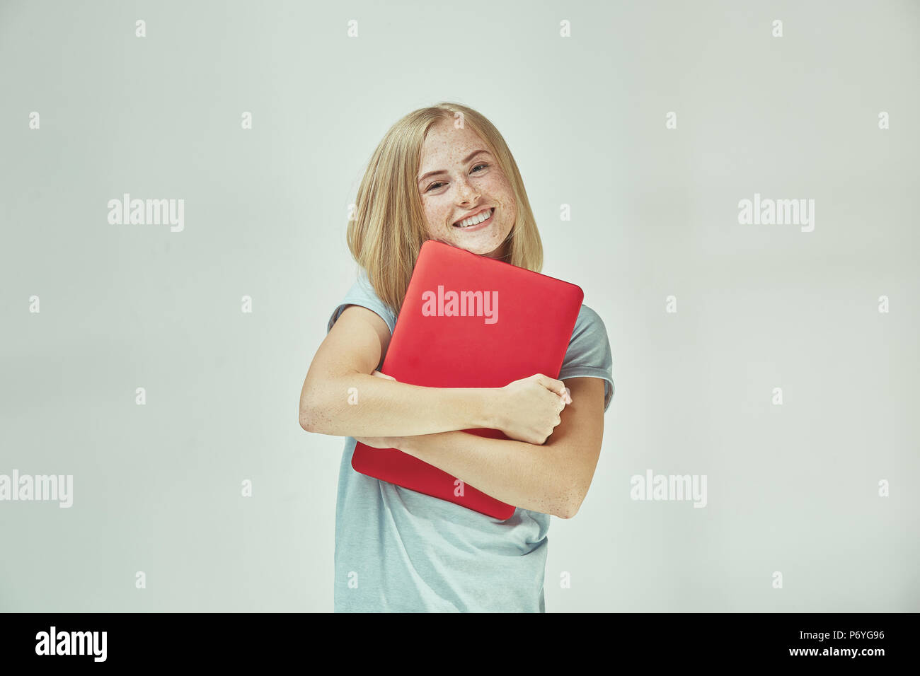 Businesswoman hugging laptop. Love to computer concept. Attractive ...