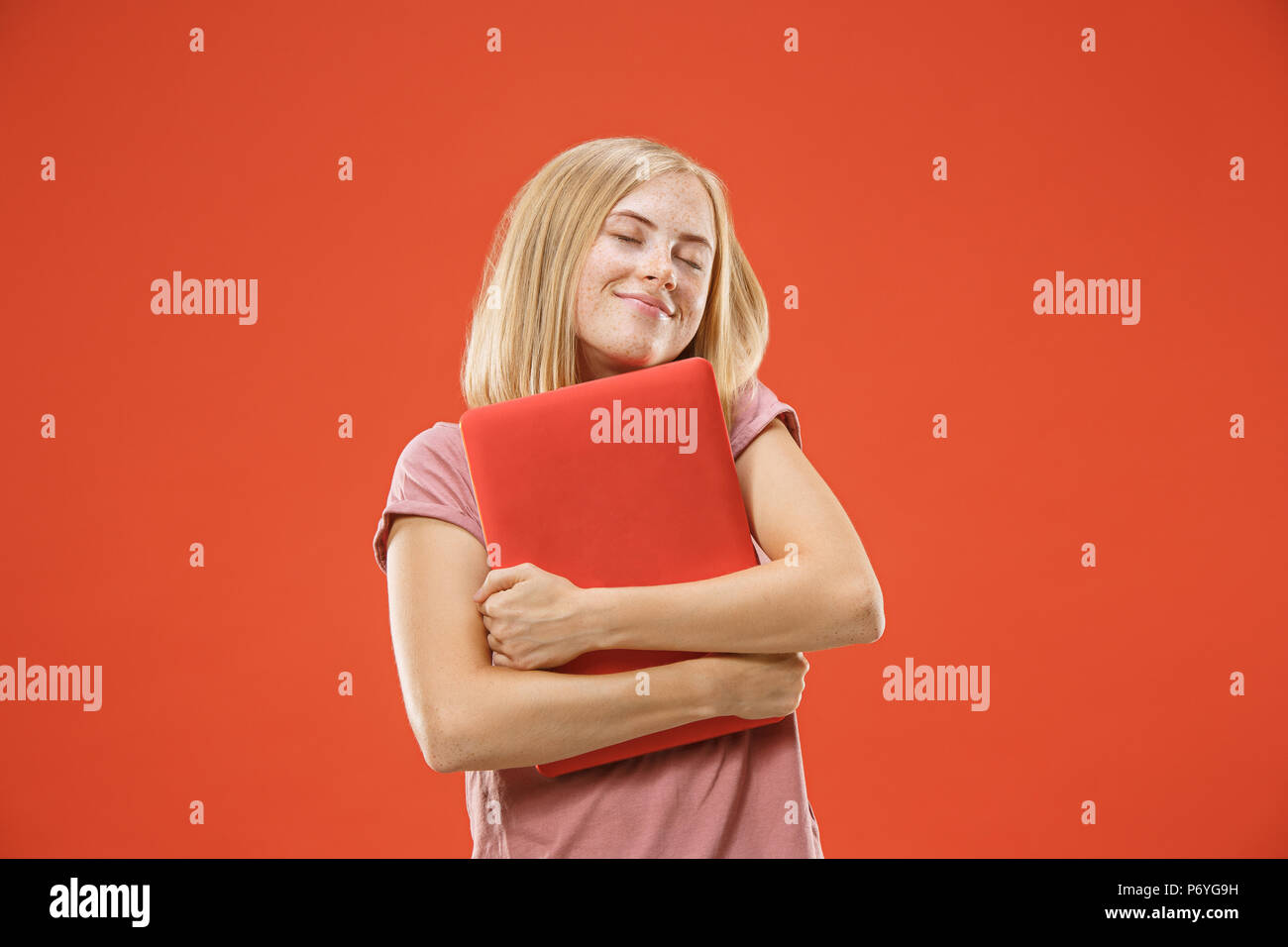 Businesswoman hugging laptop. Love to computer concept. Attractive ...