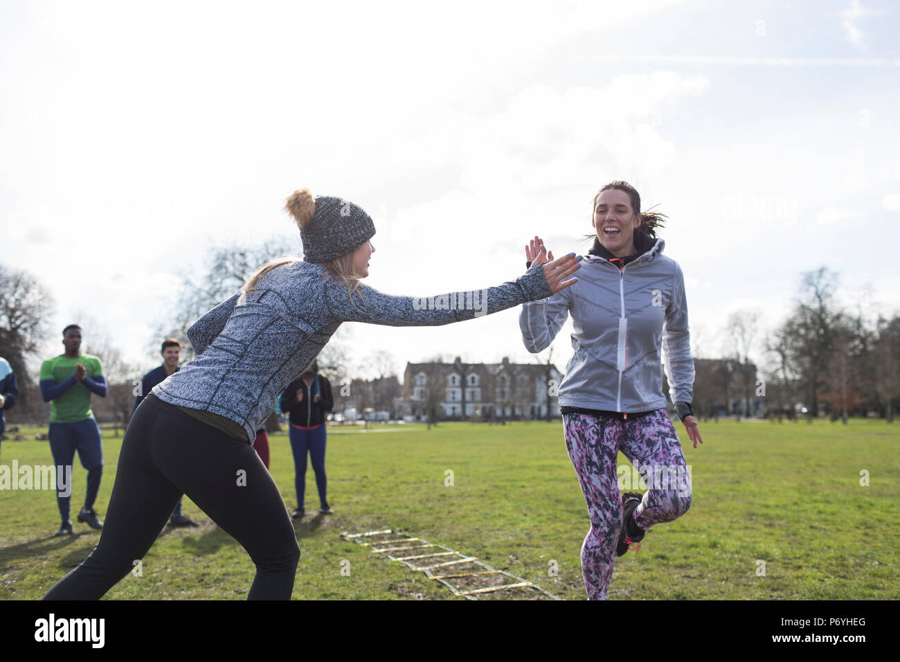 High fiving hi-res stock photography and images - Alamy