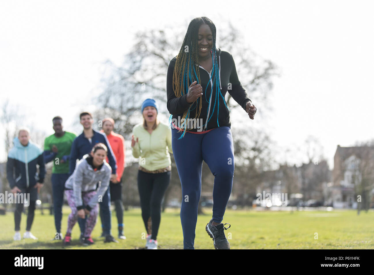Woman running cheering hi-res stock photography and images - Alamy