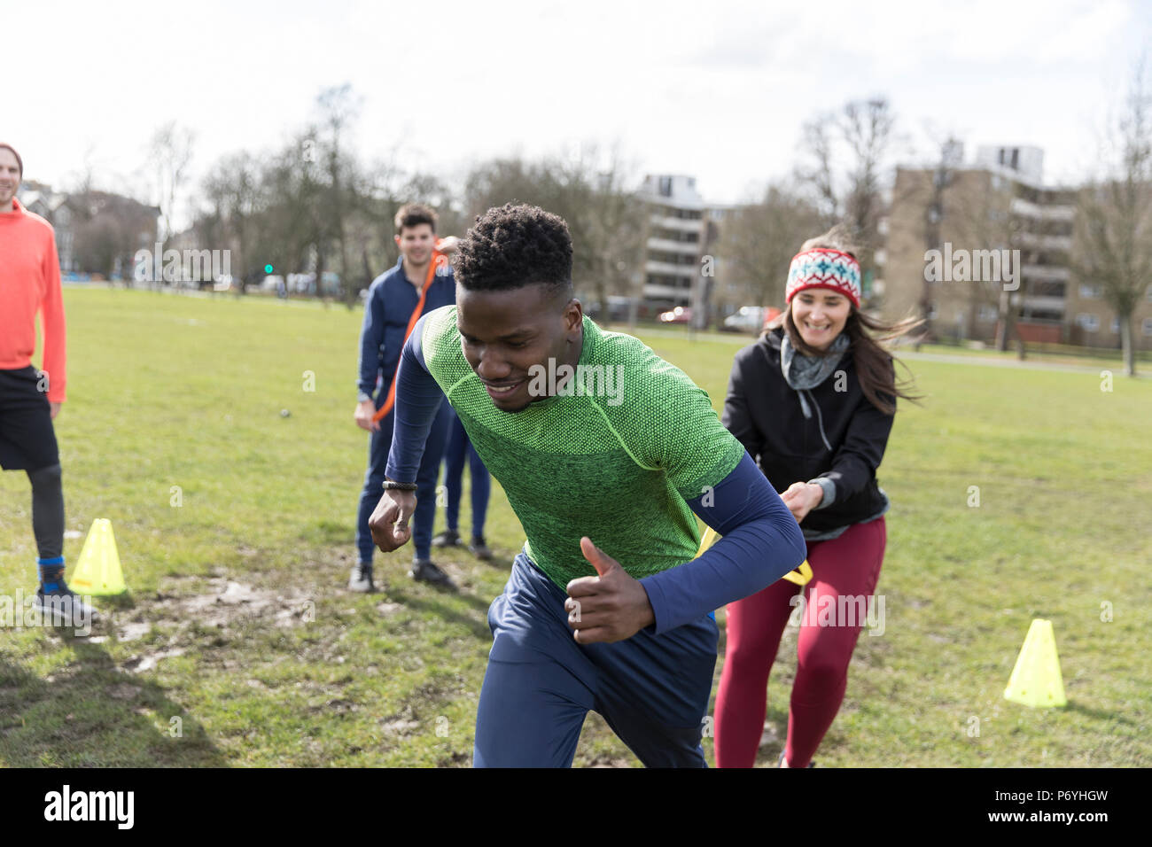 Effort teamwork holding on the move hi-res stock photography and images ...