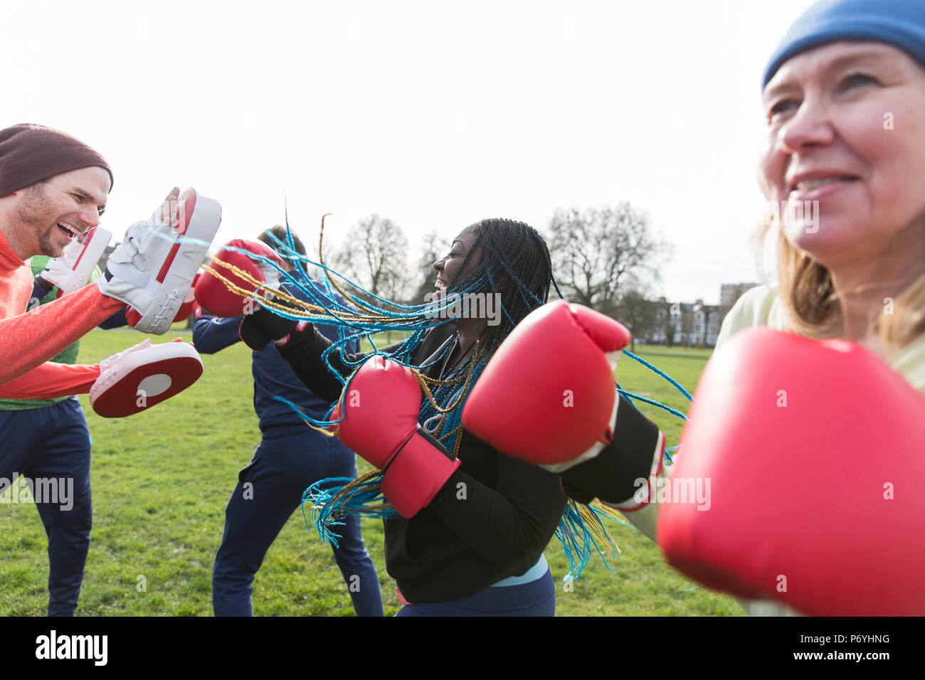 People boxing in park Stock Photo - Alamy